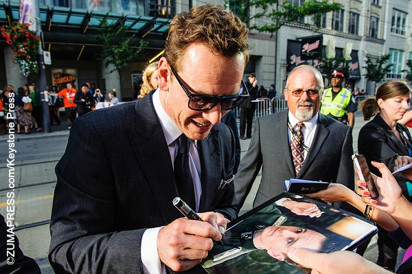 Michael signs fan memorabilia | Toronto International Film Festival TIFF