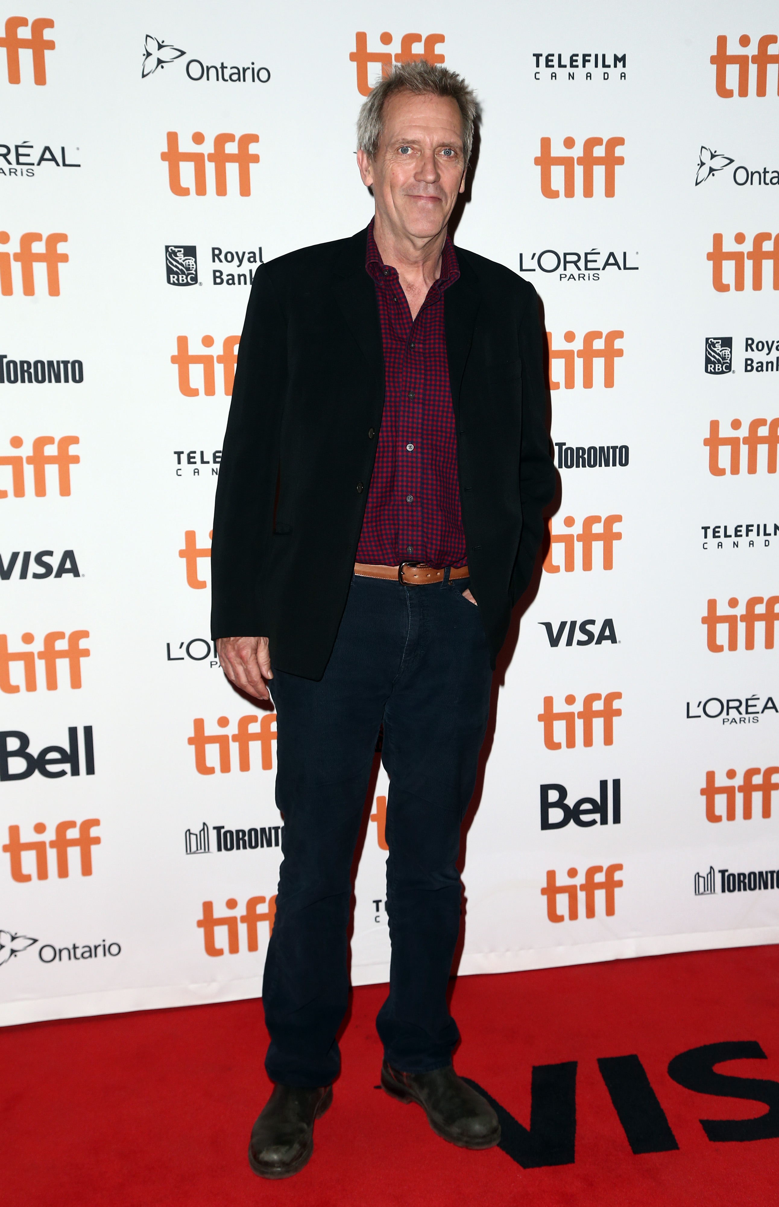 HUgh Laurie poses on the red carpet | Toronto International Film ...